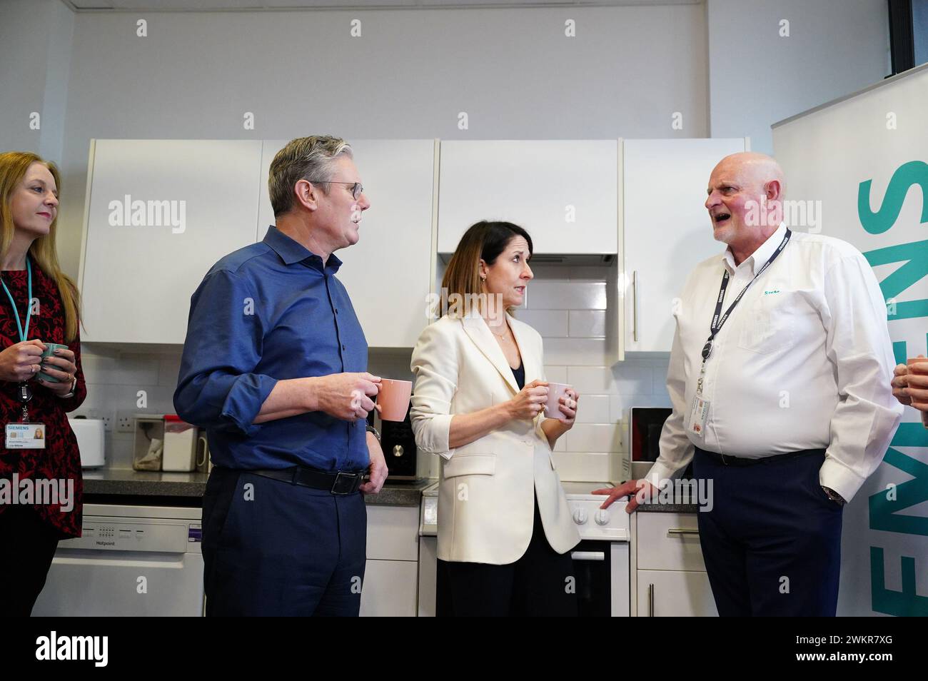 Labour leader Sir Keir Starmer (2nd left) and shadow work and pensions ...