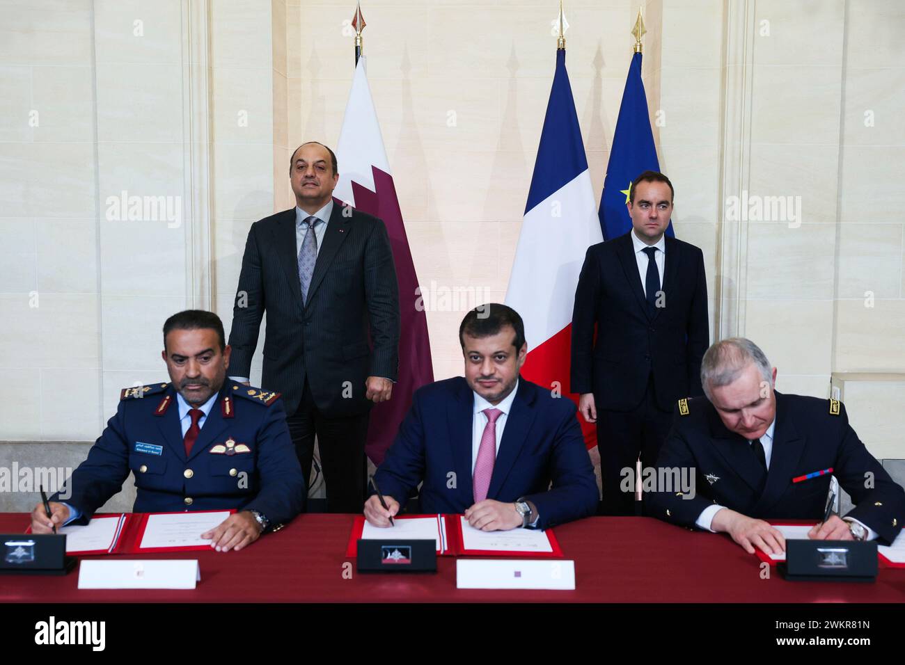 French Defense Minister Sebastien Lecornu, right behind, and Qatar's ...