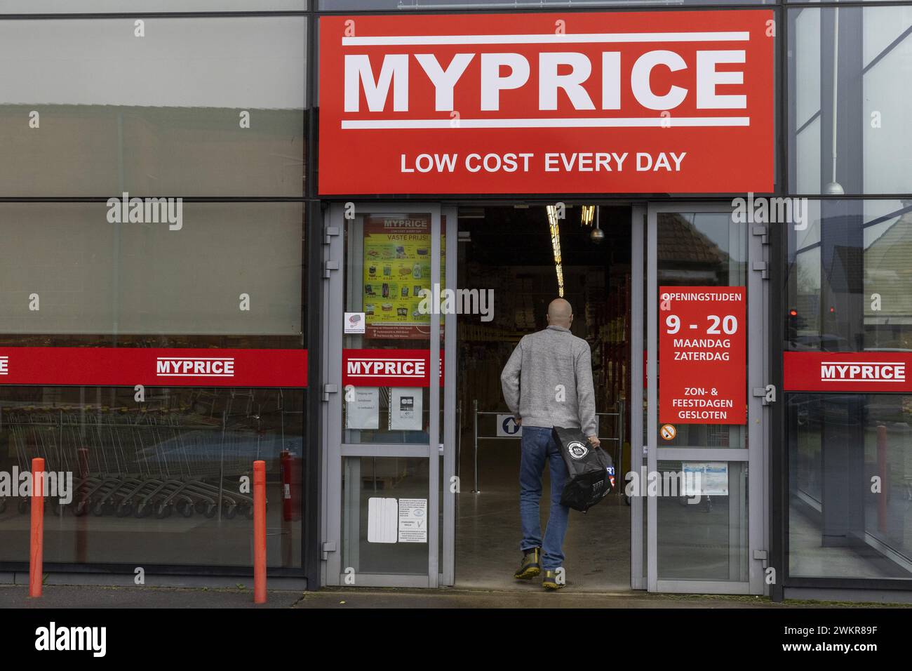 A man enters the MyPrice, the Russian supermarket in Opwijk, , Thursday ...