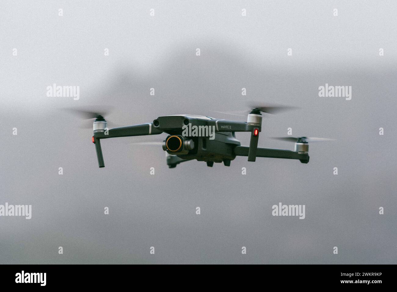 Drone dji mini in the air Stock Photo - Alamy