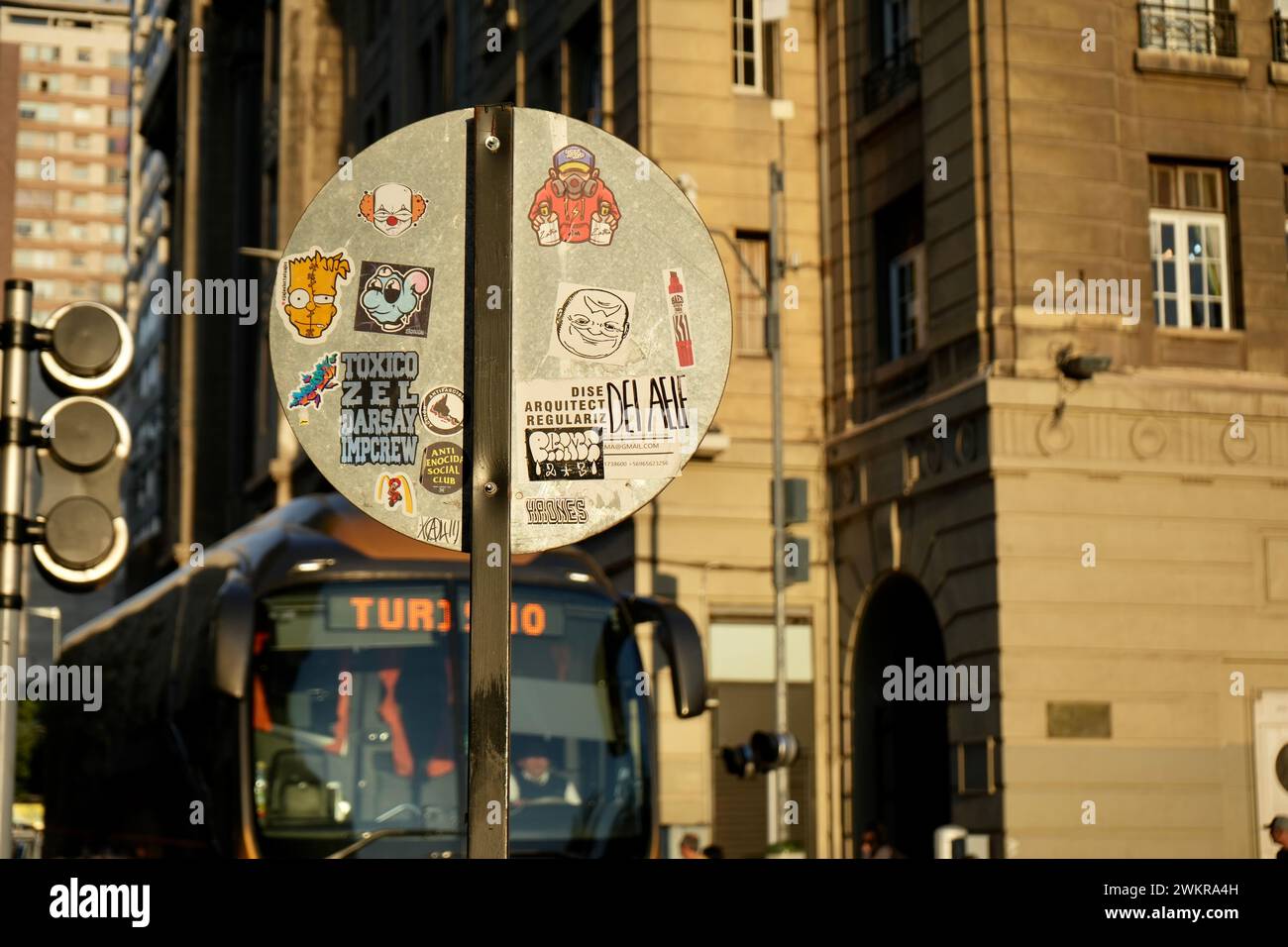 Stickers on the back of a street sign on Plaza de Armas. Santiago ...