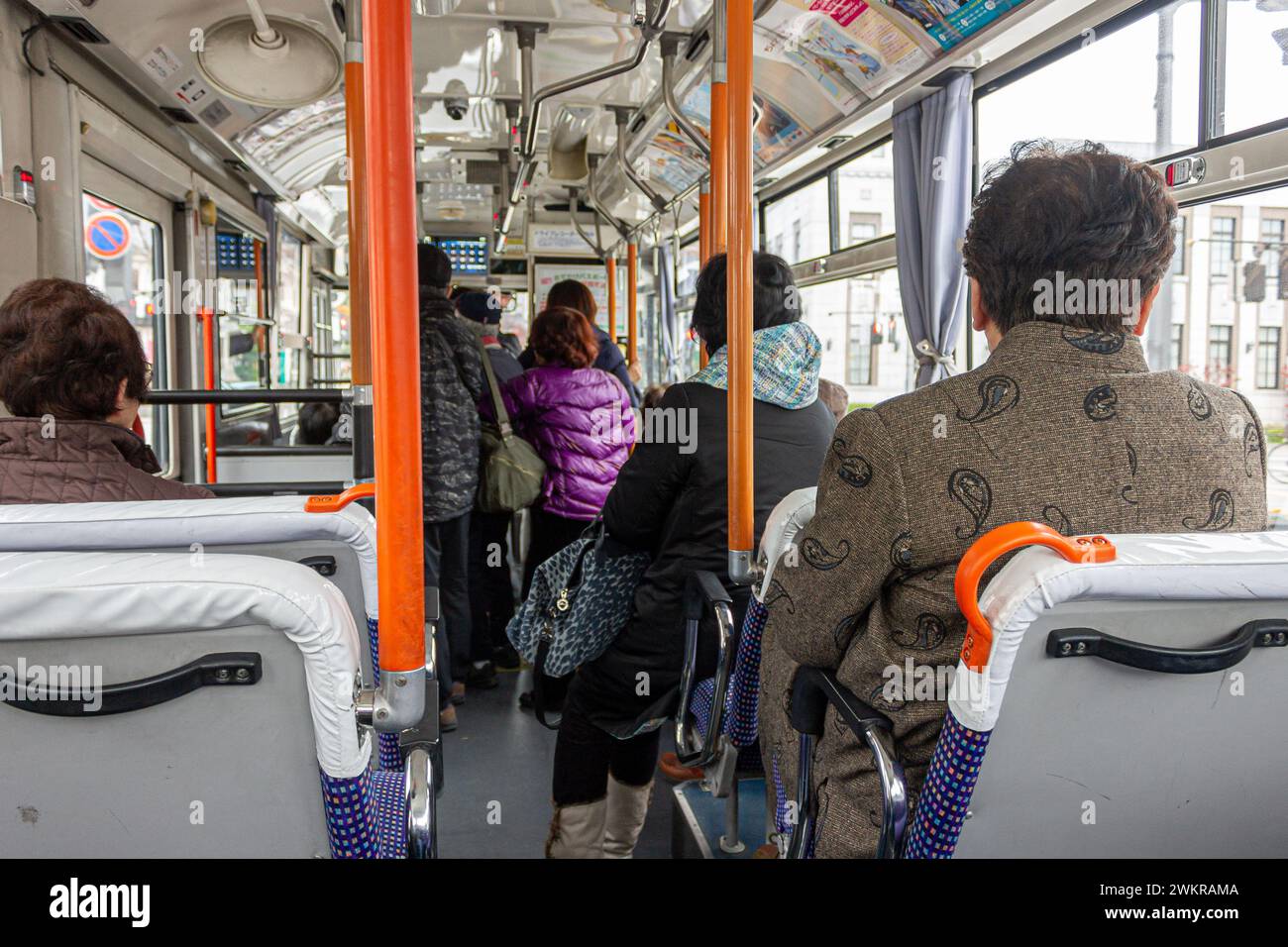 Nagano, Japan. Inside a Japanese bus full of people Stock Photo - Alamy