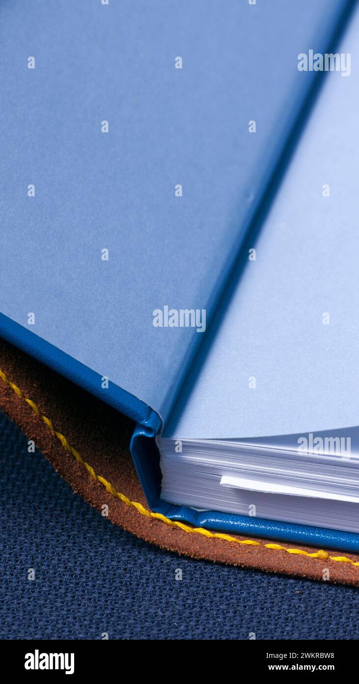 Blue cardboard in book Stock Photo - Alamy