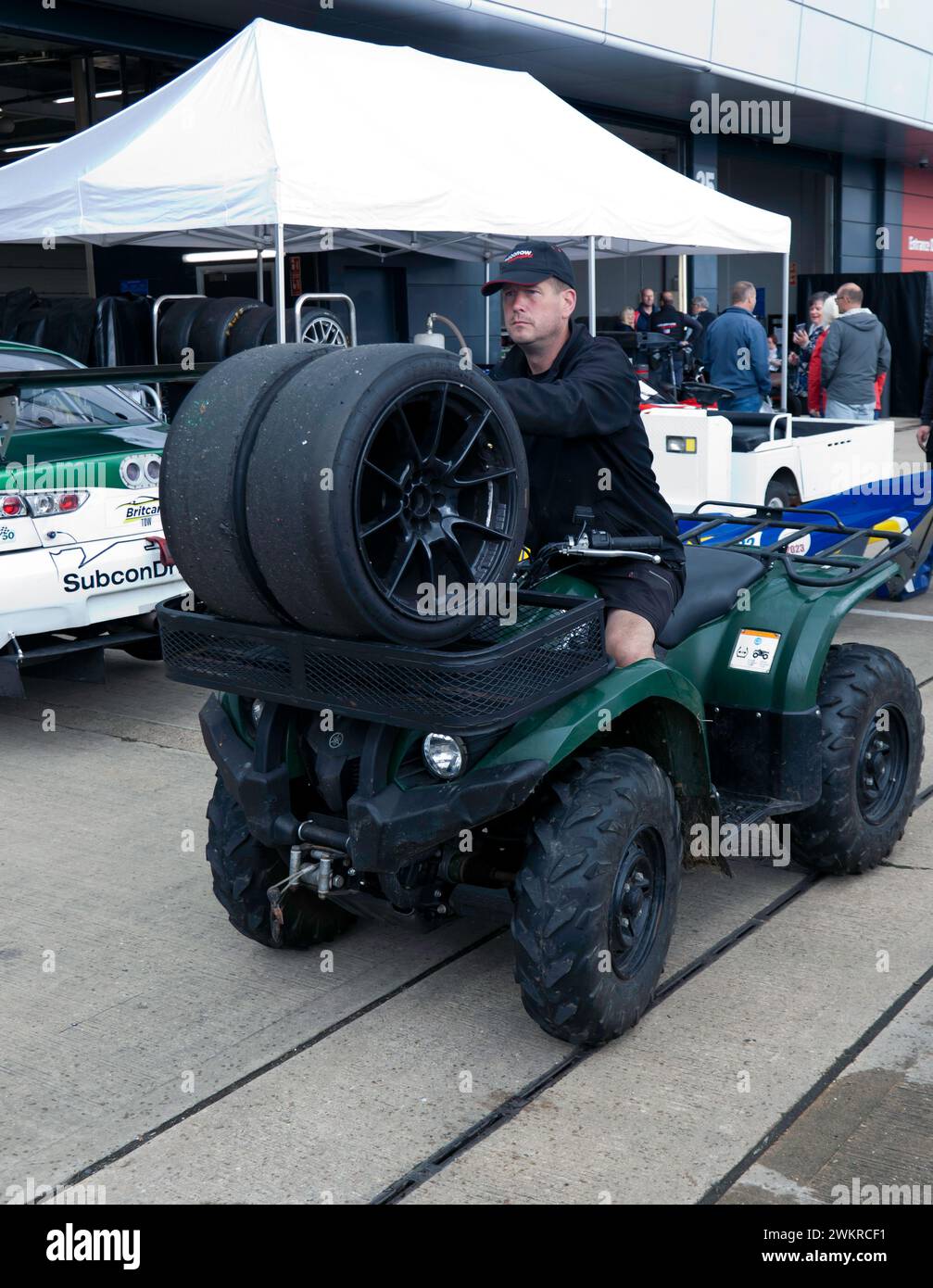 Racing Tyres being transported along the International Paddock on a ...