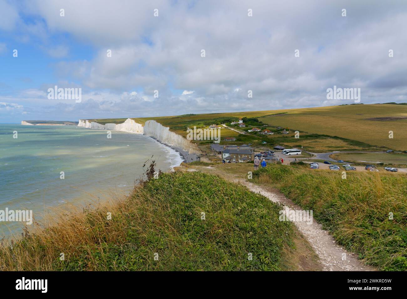 Birling Gap - England, July 17 2023: Visitors standing on the chalk ...