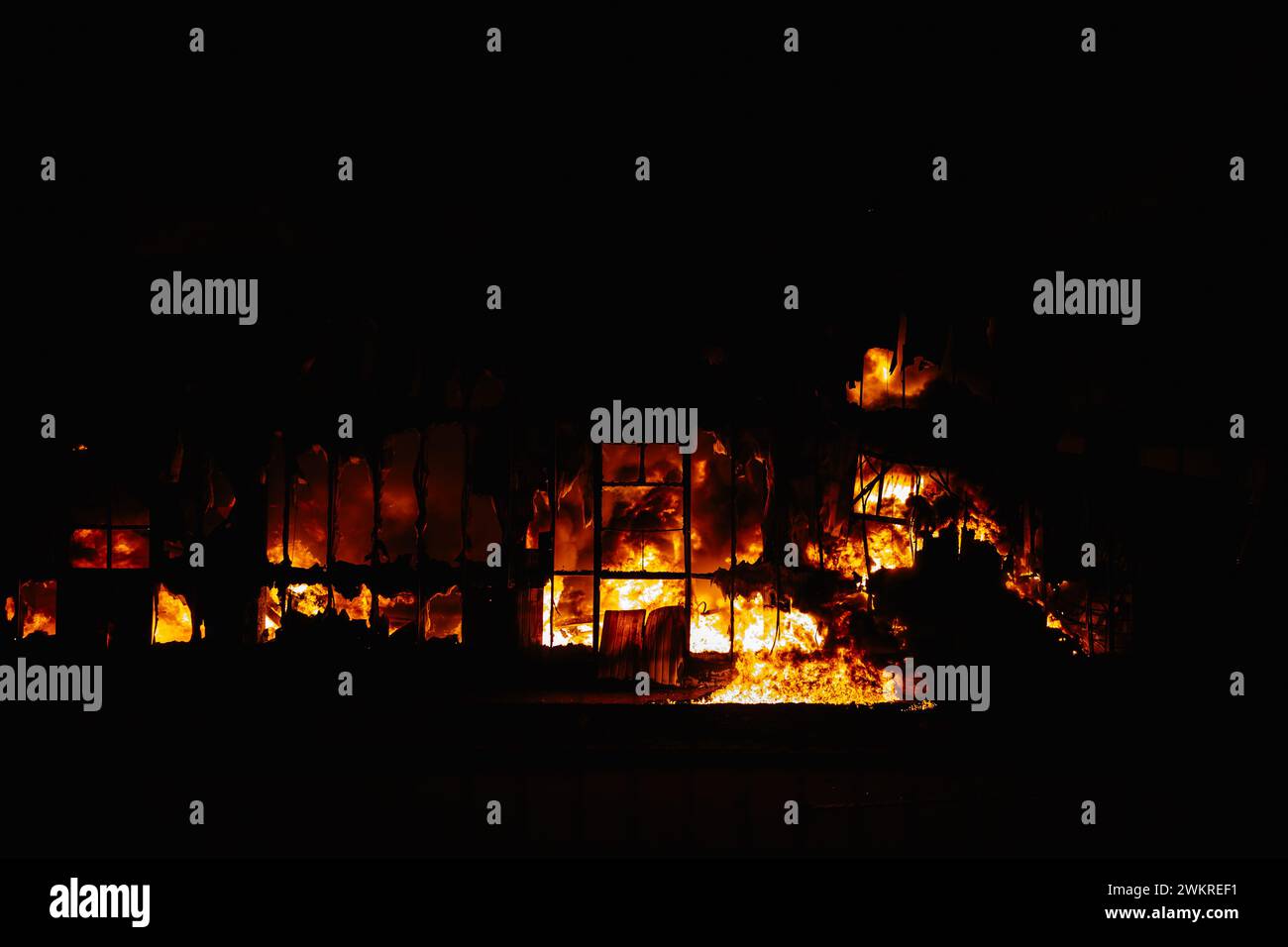 Fire Burning Inside Building at Night Stock Photo - Alamy