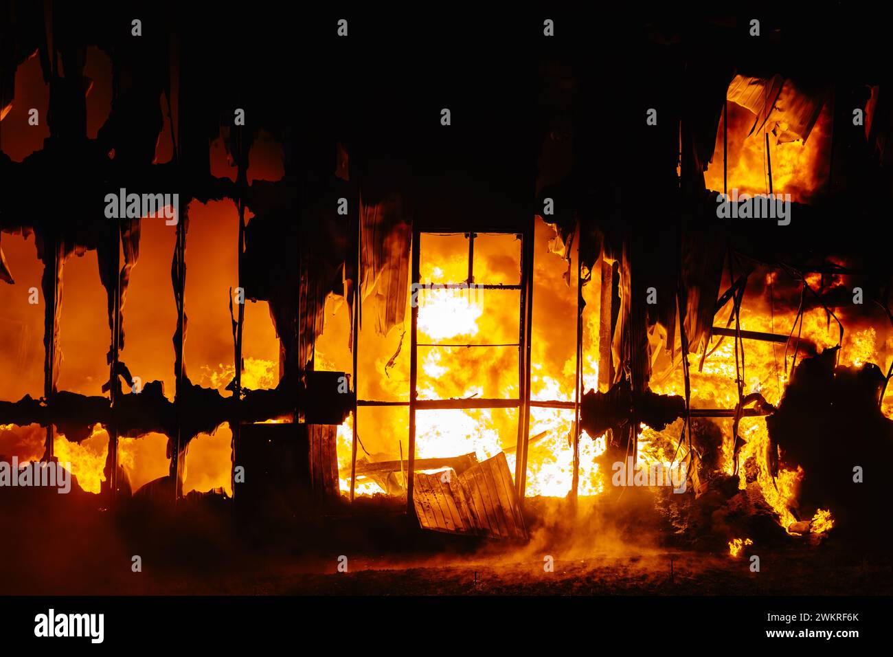 Fire Burning Inside Building at Night Stock Photo - Alamy