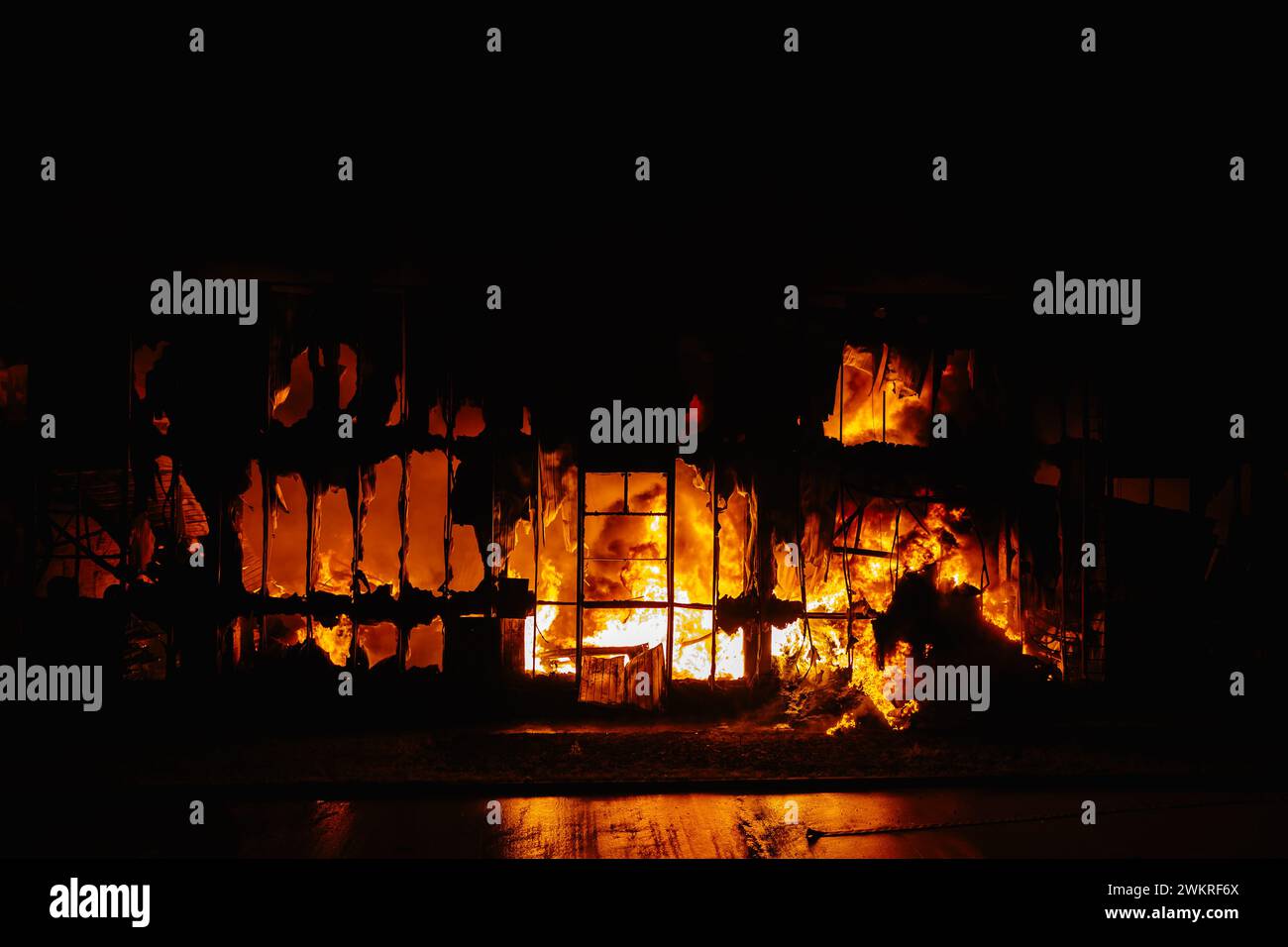 Fire Burning Inside Building at Night Stock Photo - Alamy