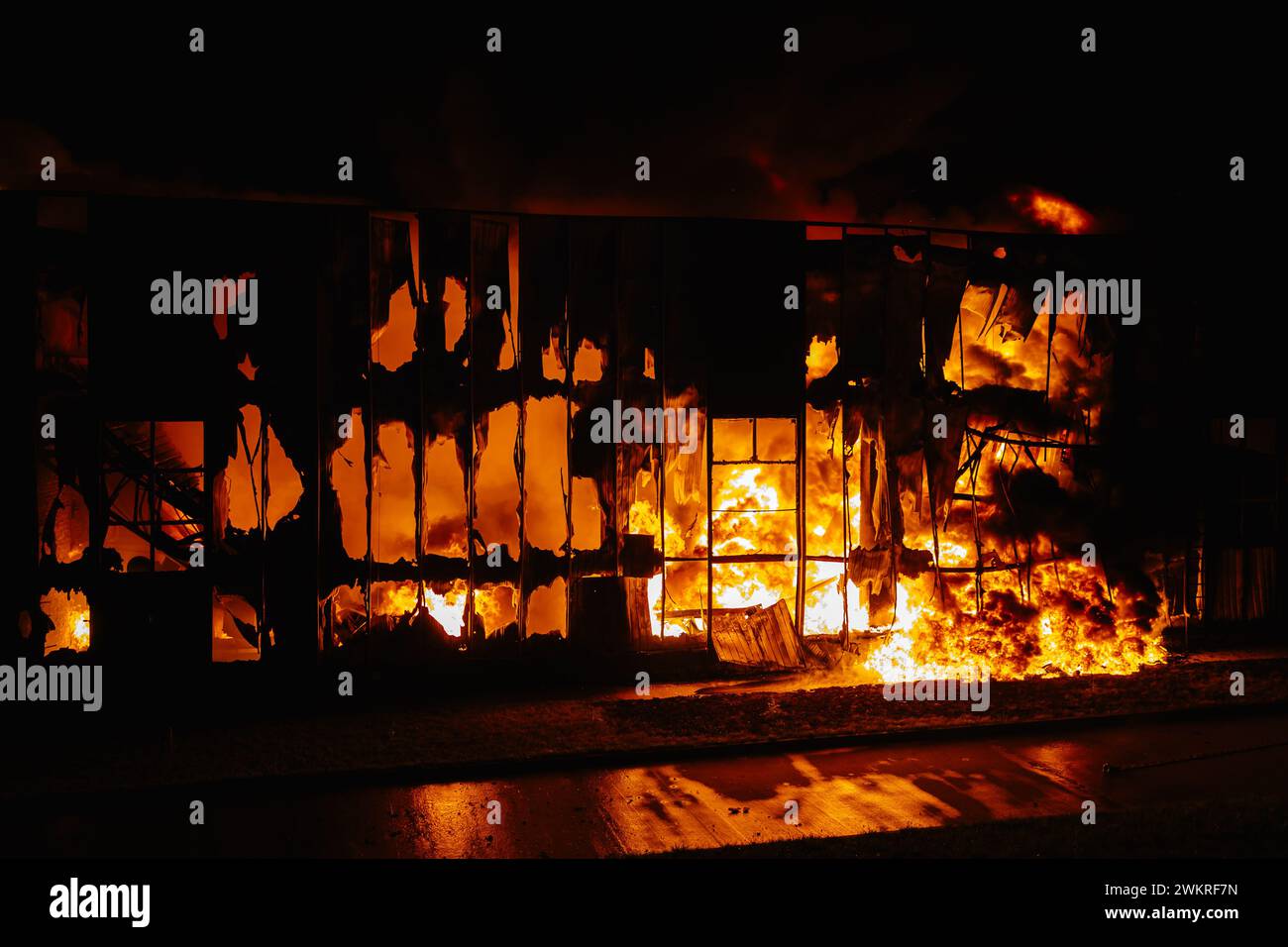 Fire Burning Inside Building at Night Stock Photo - Alamy