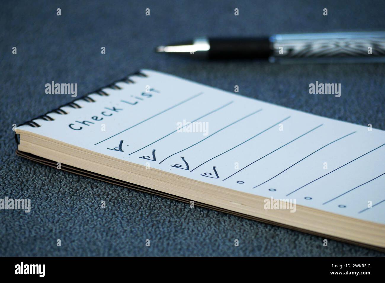 A businessman preparing checklist at office desk Stock Photo - Alamy