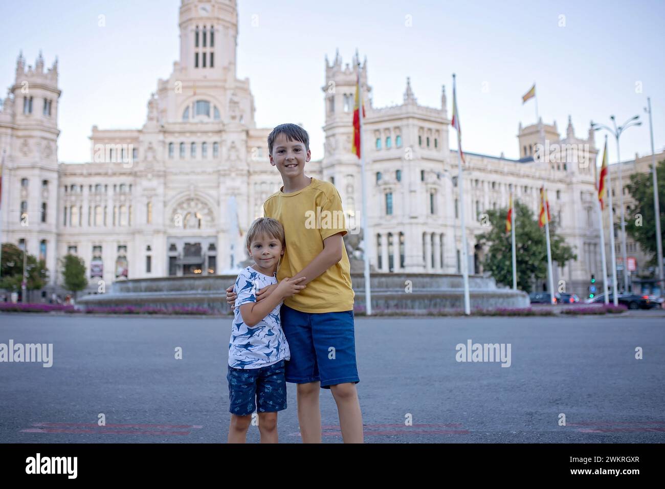 Family with children, siblings, visiting Madrid during family vacation ...