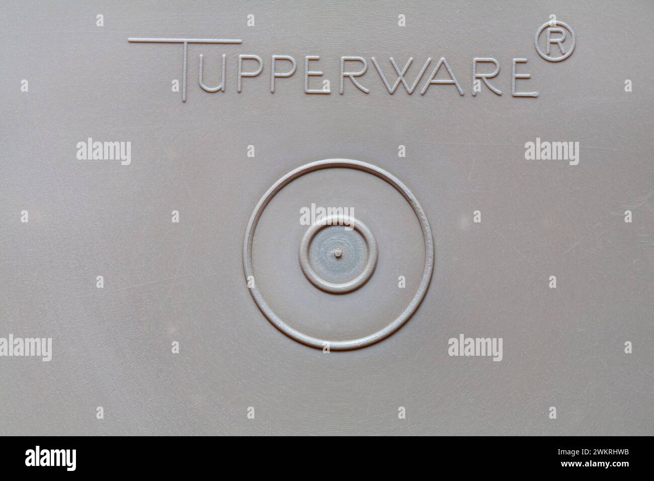 Tupperware logo on old plastic Tupperware storage container Stock Photo ...