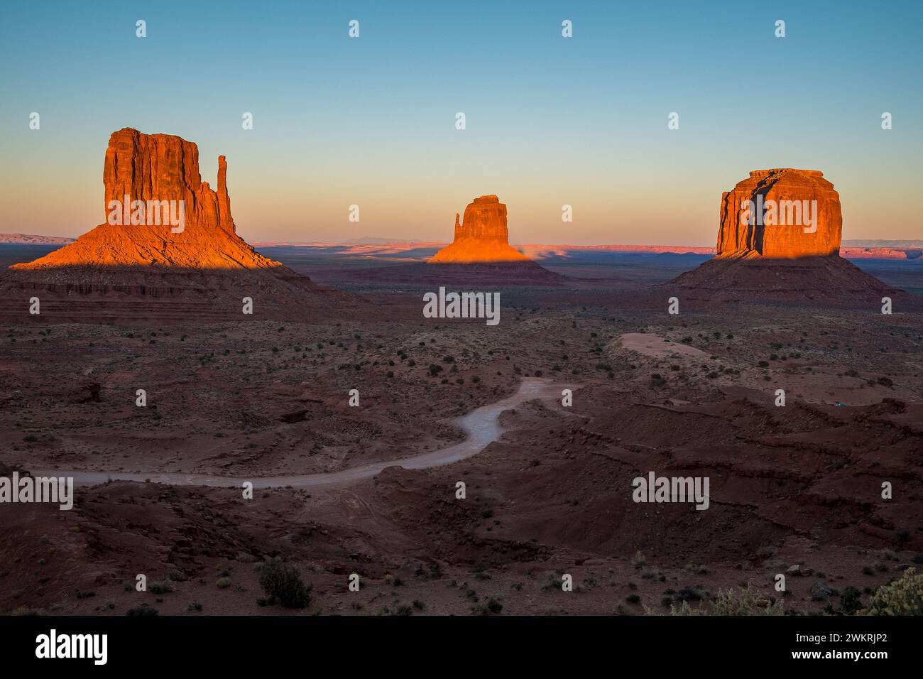 The iconic buttes during sunset in Monument Valley, which is famous for ...