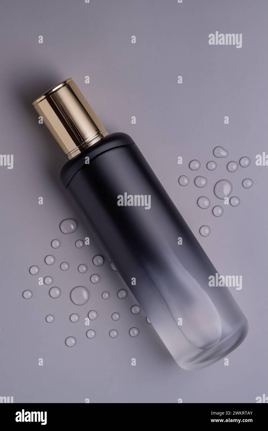 Luxury bottle of toner on gray background. Skincare Product. Toner with ...