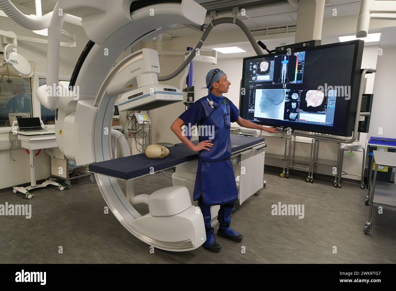 Clinical Radiologist Dr Nik Arestis with the new Alphenix Sky+ system ...