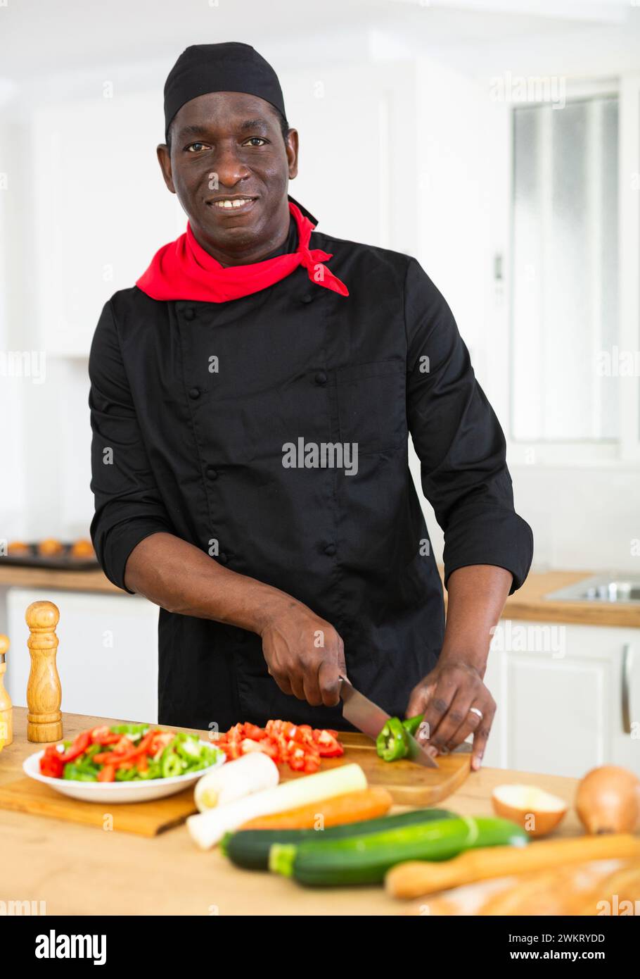 Black man male cook hi-res stock photography and images - Alamy
