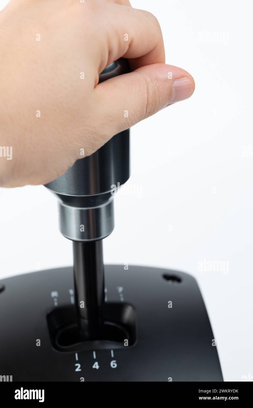 Manual car metal gear stick in hand macro close up view isolated on ...