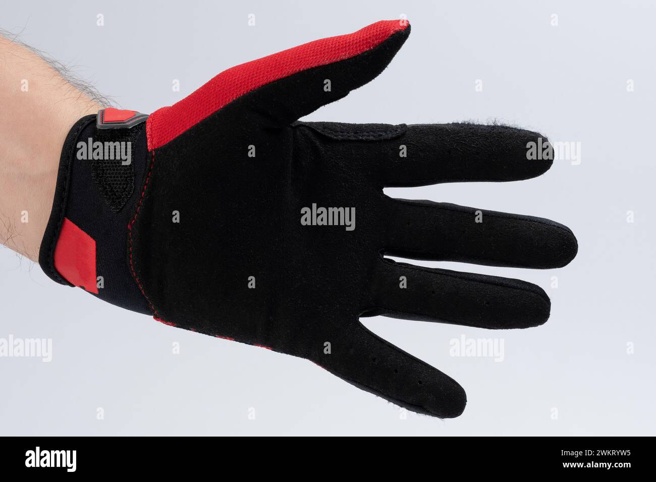 Open hand plam in sport black glove isolated on white studio background ...