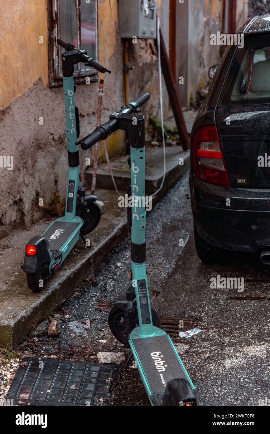 Sarajevo - BiH - 11 FEB 2024: Two e-scooters by Binbin in the streets of Sarajevo. Binbin is a ...