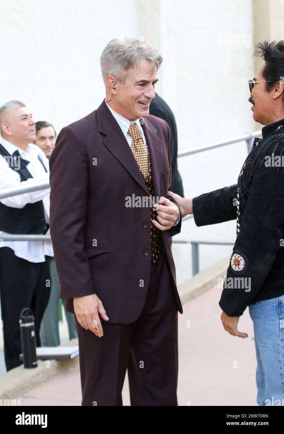 Dermot Mulroney takes photos with friends out in the city. Featuring ...