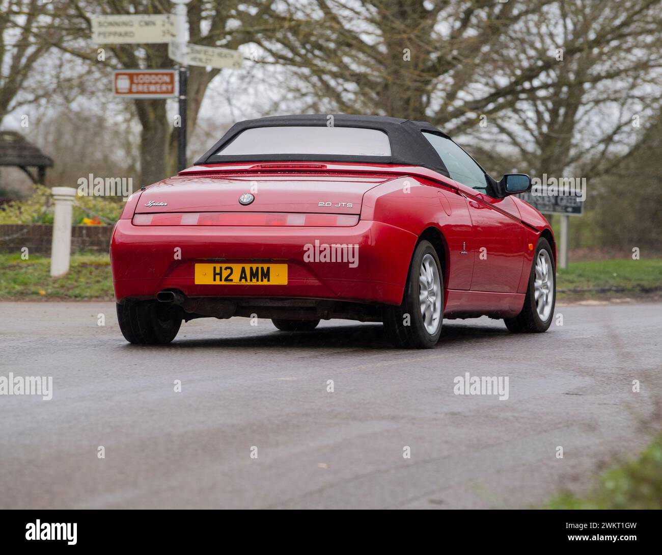 1990s/2000's Alfa Romeo Spider convertible sports car driving in the UK ...