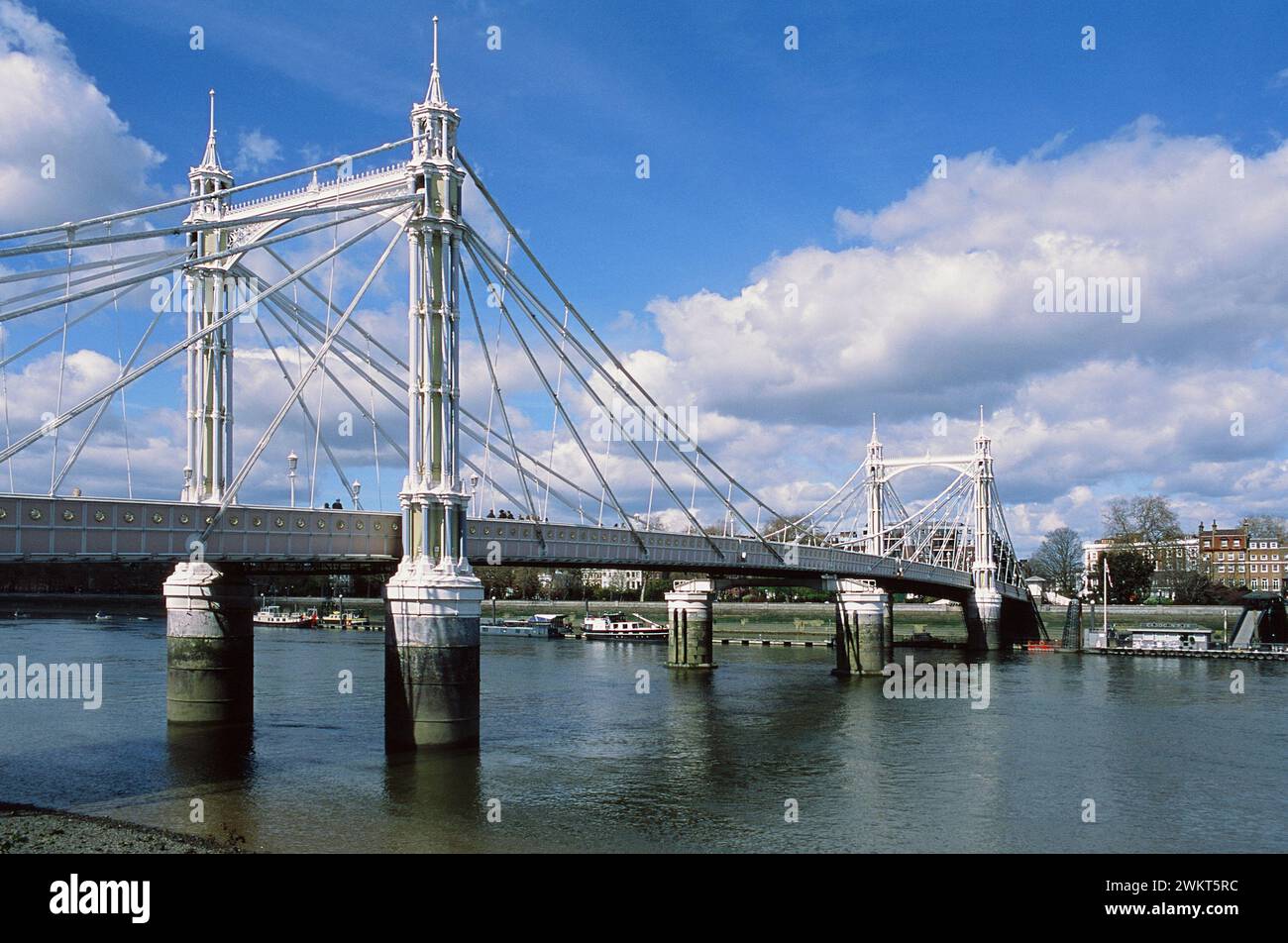 Albert Bridge across the River Thames, from Battersea Park, London UK ...