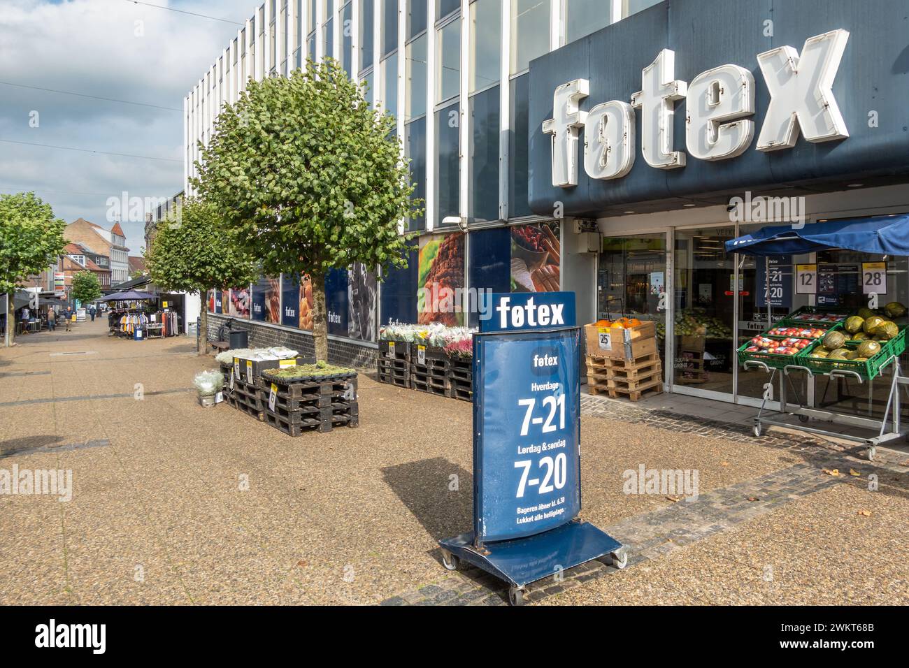 Street scene of shopping street and Fotex supermarket in center of ...
