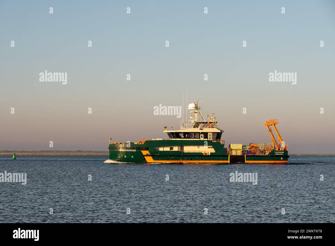 Dutch research and survey ship Geo Ranger on Wadden Sea near harbour of ...