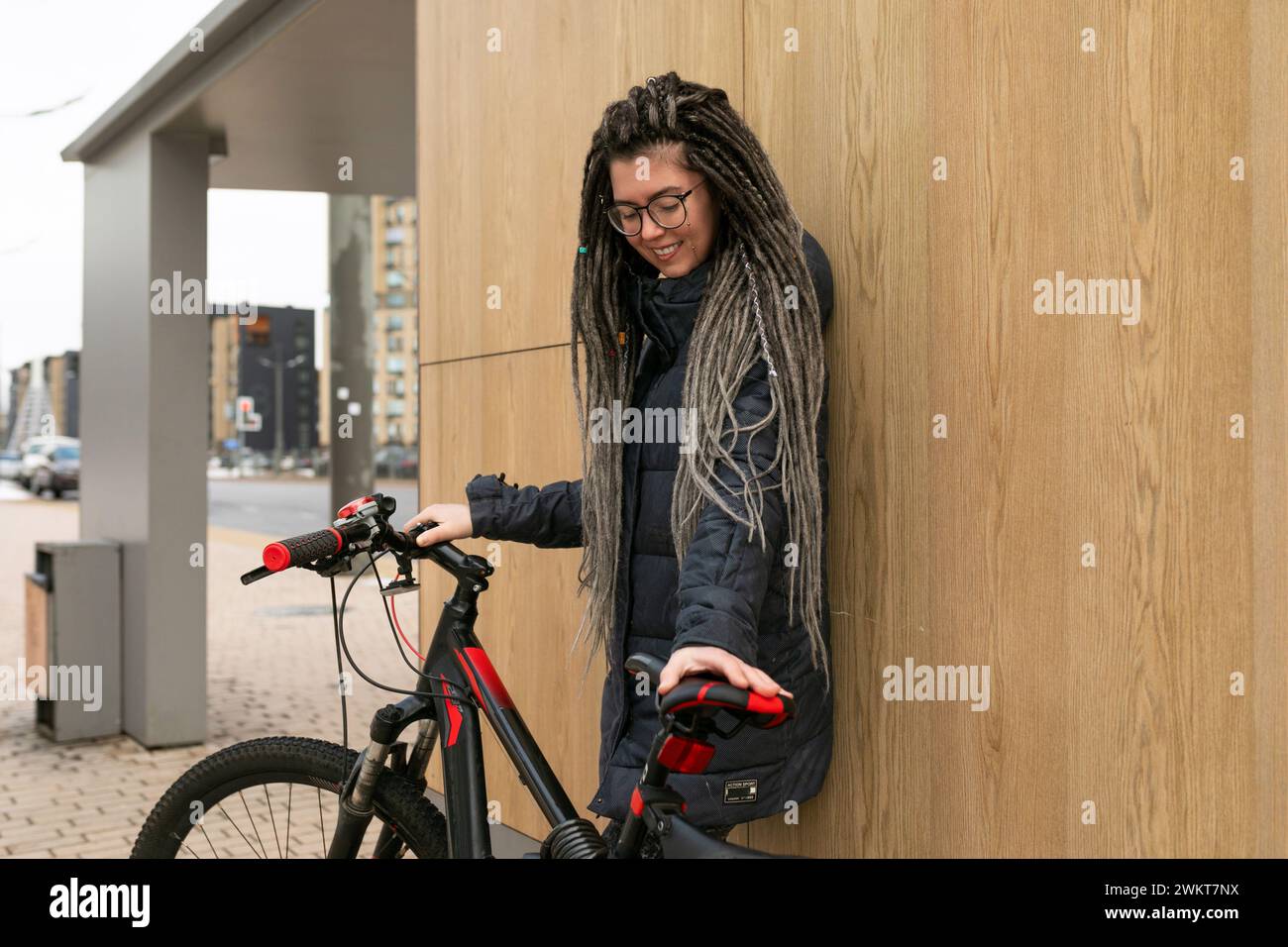 Lifestyle concept, young European woman with informal dreadlocks ...