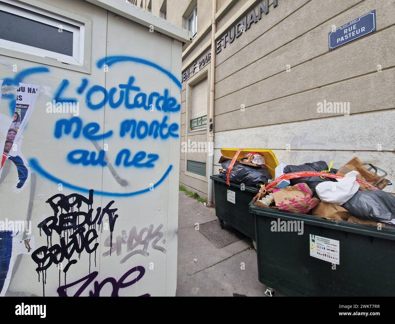 Poor sorting of garbage, street view, Lyon, France Stock Photo - Alamy