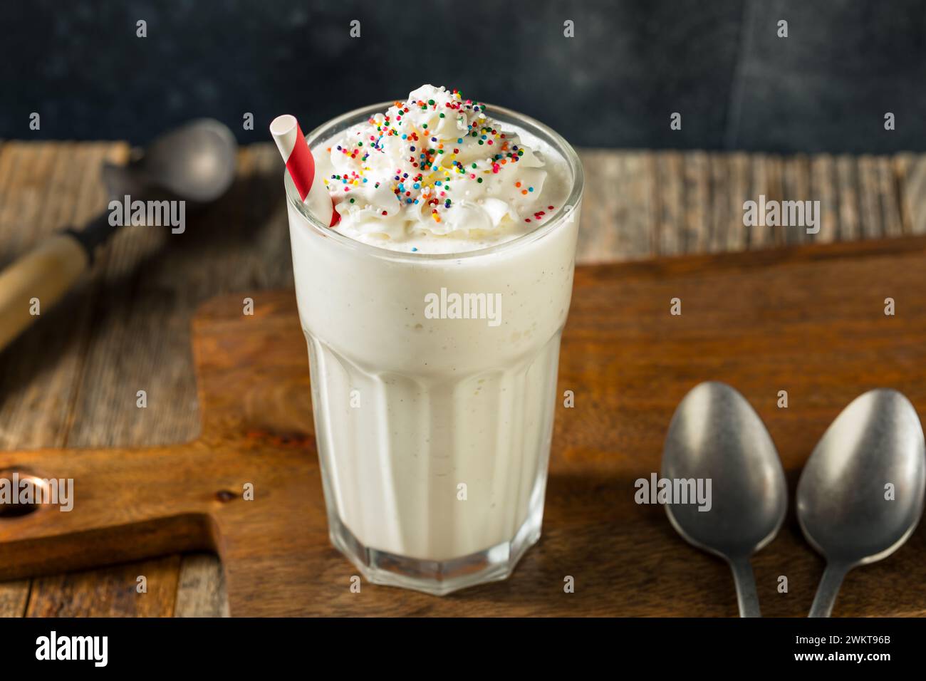 Frozen Blended Vanilla Milkshake with Ice Cream and Sprinkles Stock ...