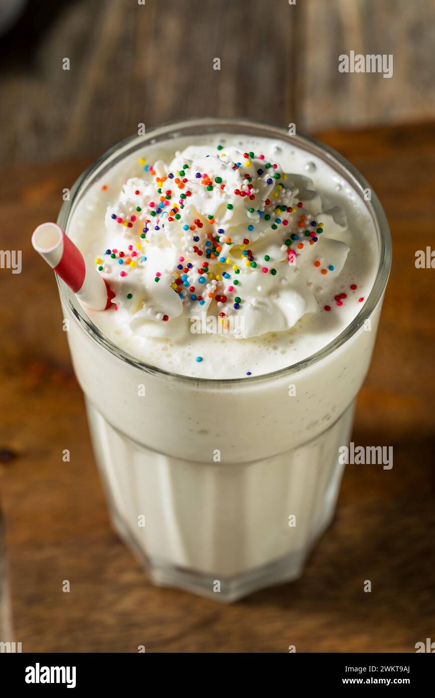 Frozen Blended Vanilla Milkshake with Ice Cream and Sprinkles Stock ...