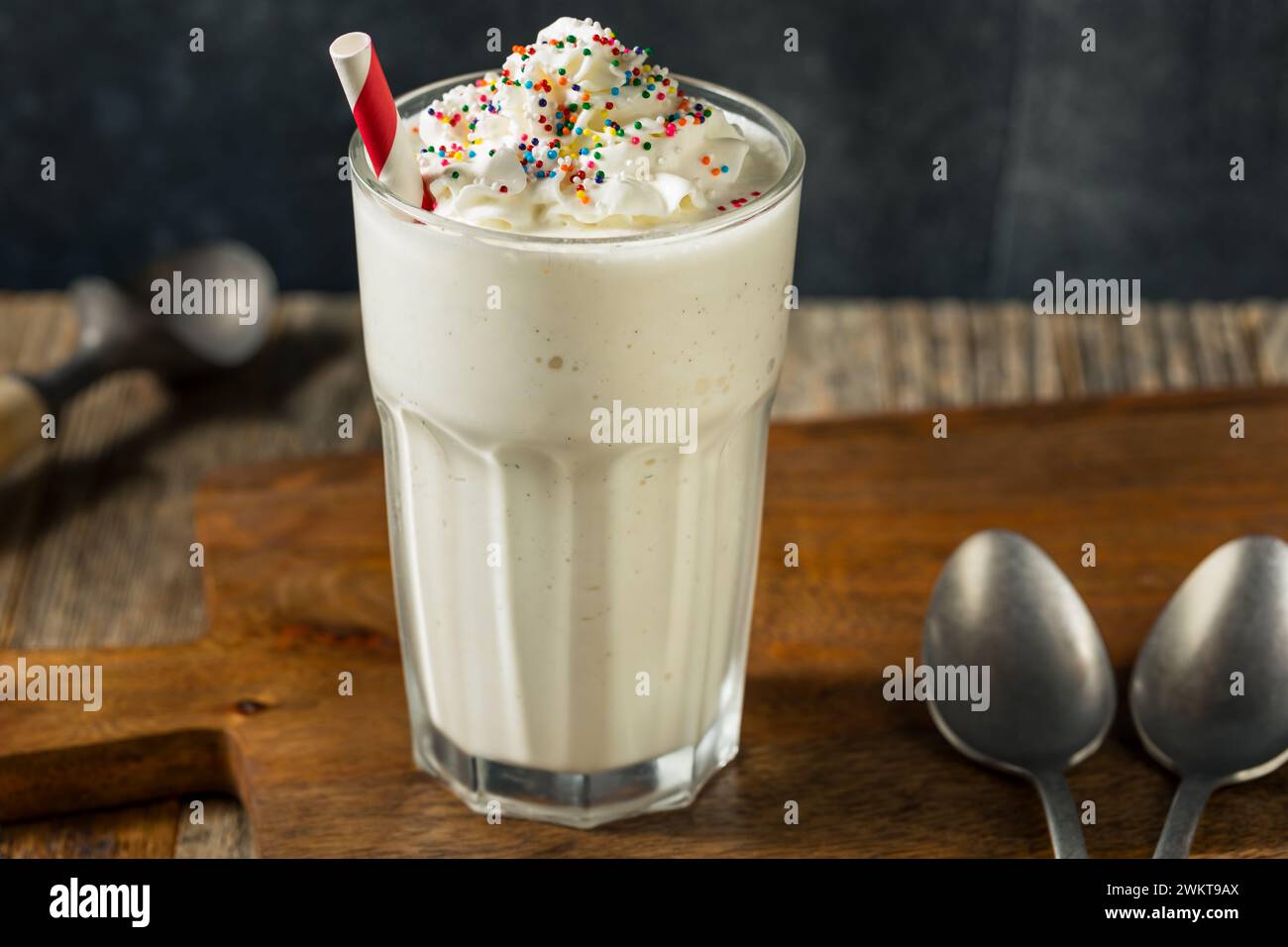 Frozen Blended Vanilla Milkshake with Ice Cream and Sprinkles Stock ...