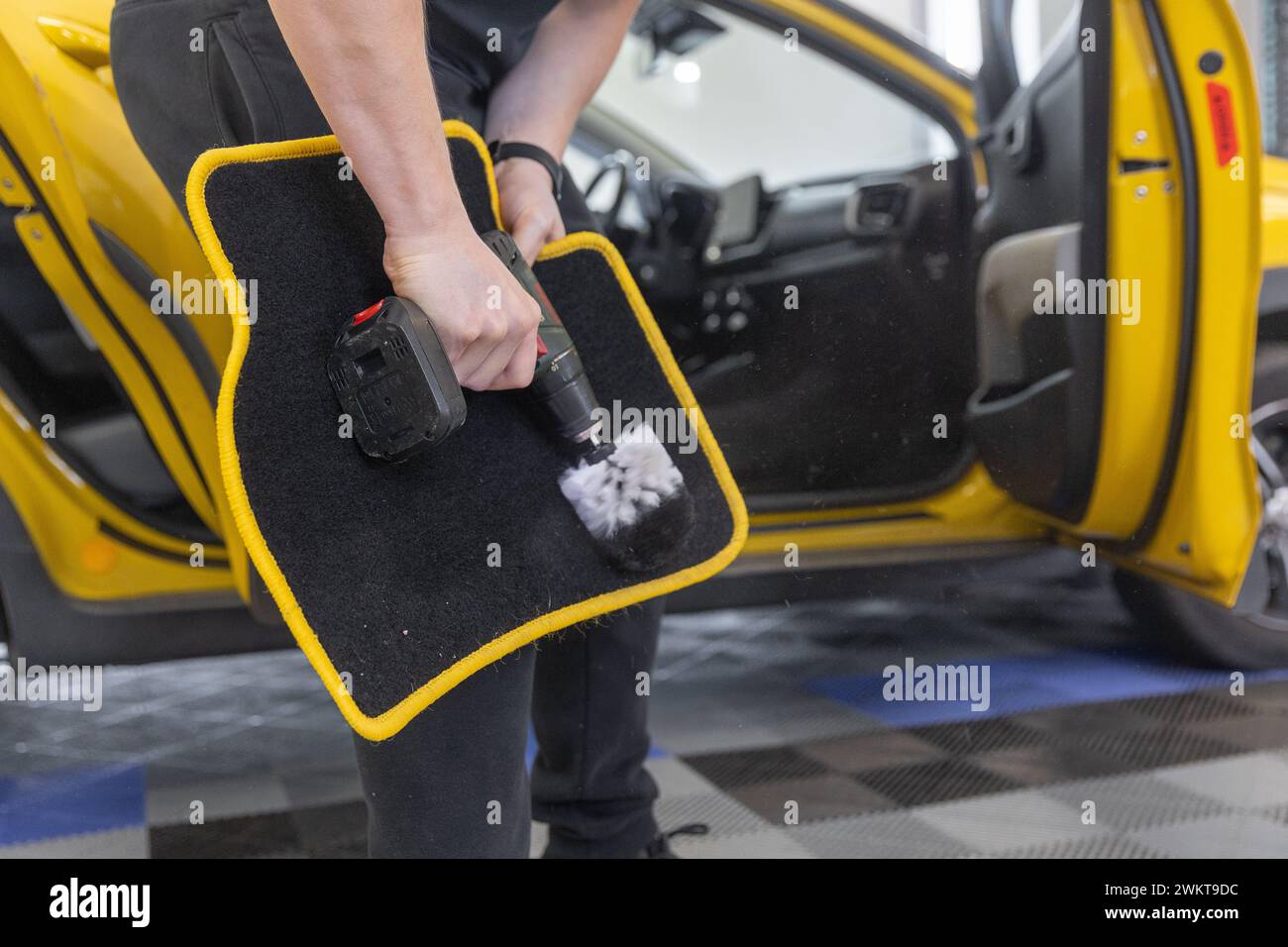 Process of cleaning a car mat by an automatic brush cleaner, car ...