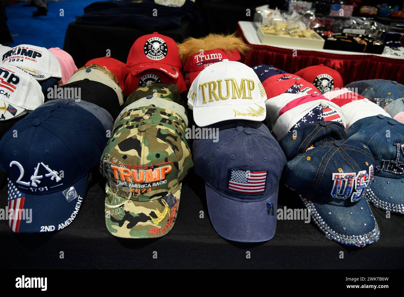National Harbor, United States. 22nd Feb, 2024. Baseball caps featuring ...