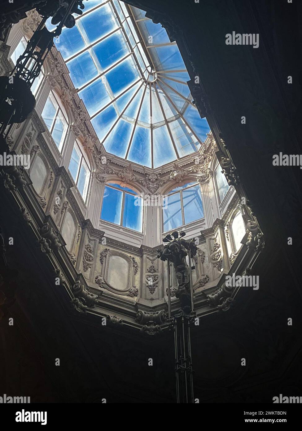 The interior skylight in a building with columns and sculpture Stock ...