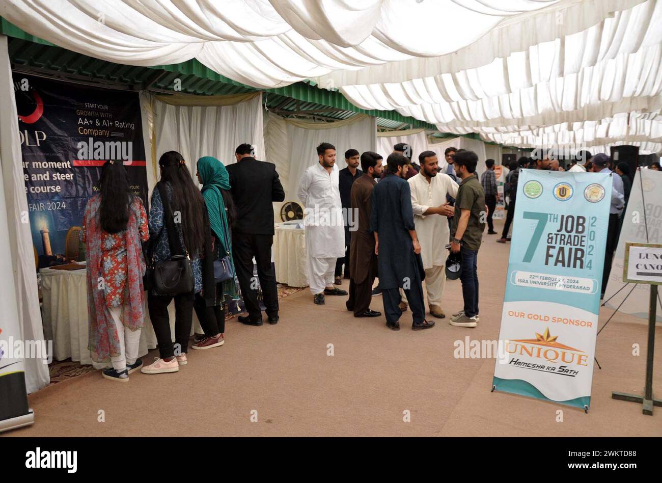 Visitors take keen interest in different stalls during the 7th Job and Trade Fair 2024 held at ...