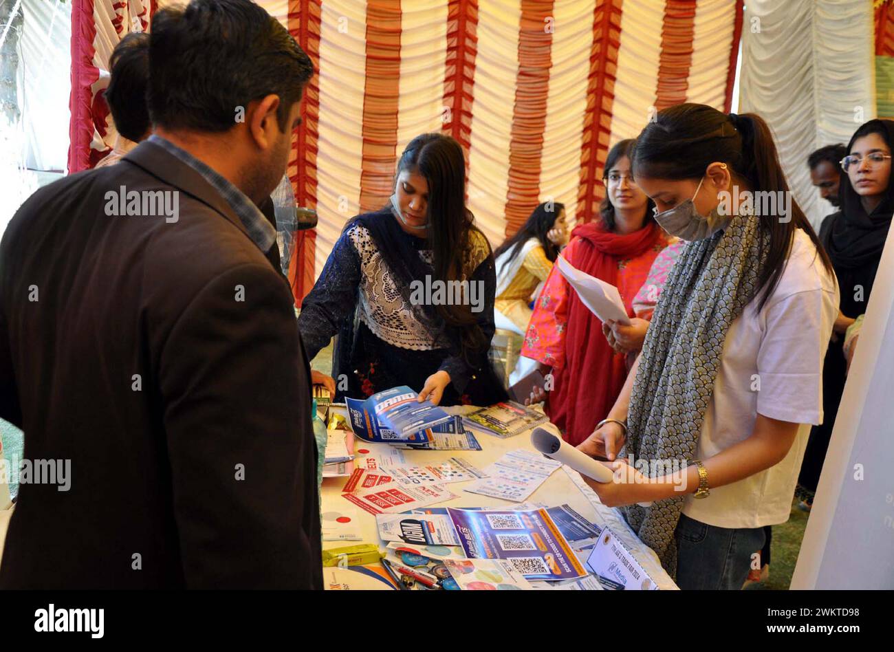 Visitors take keen interest in different stalls during the 7th Job and Trade Fair 2024 held at ...