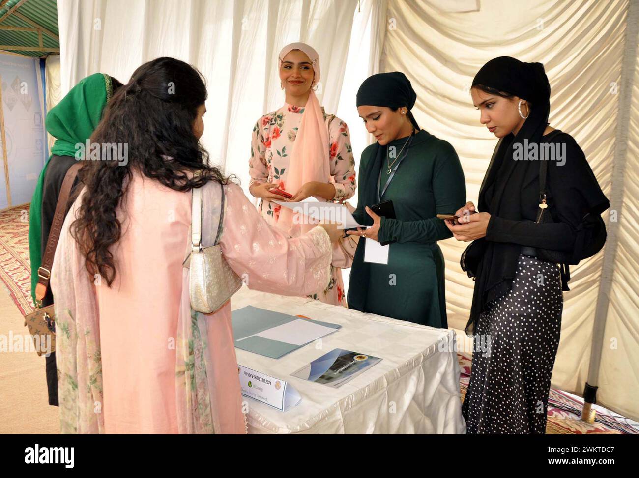 Visitors take keen interest in different stalls during the 7th Job and Trade Fair 2024 held at ...