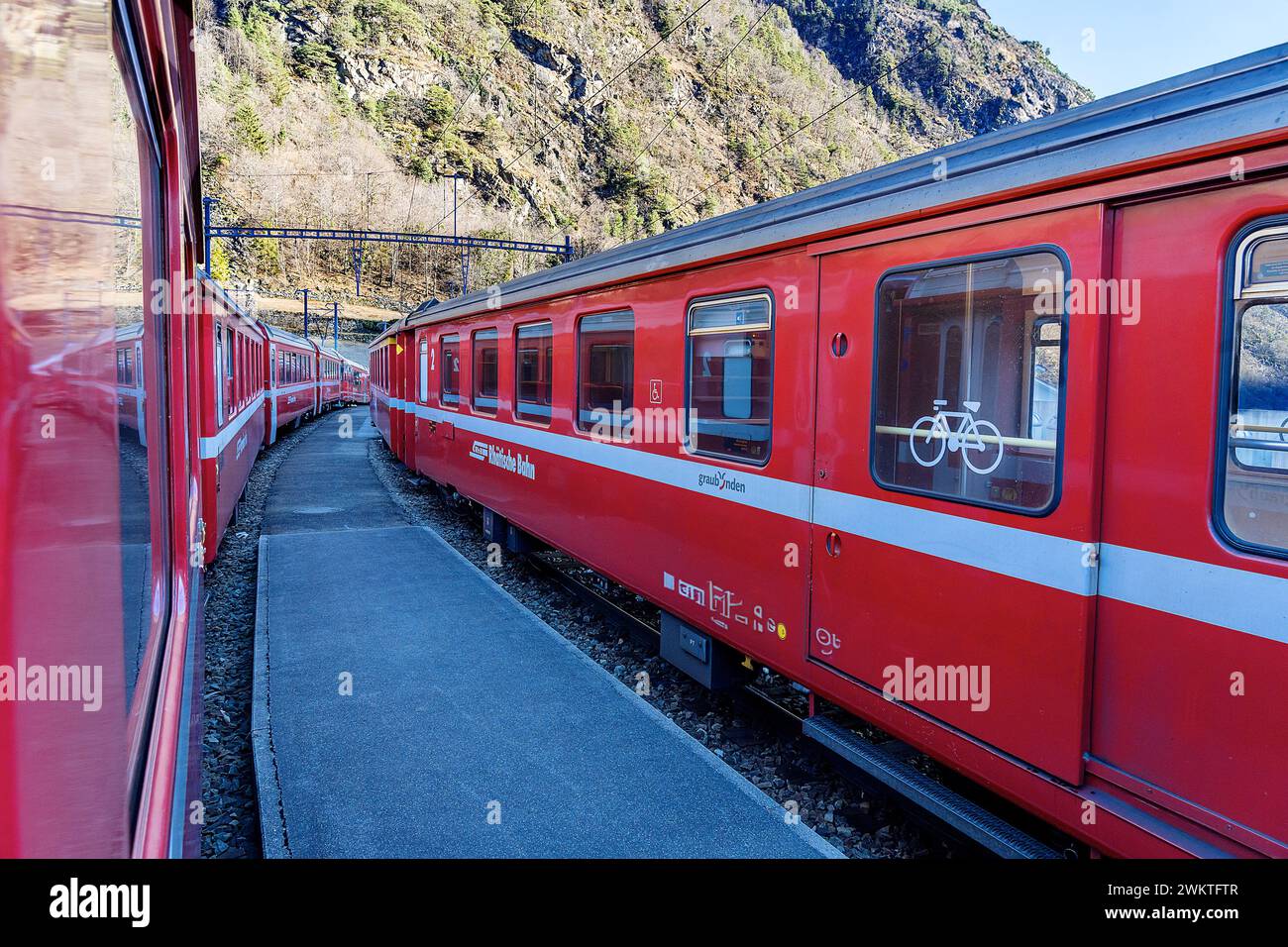 Switzerland 01-13-2024: Two red Bernina trains cross at the station ...