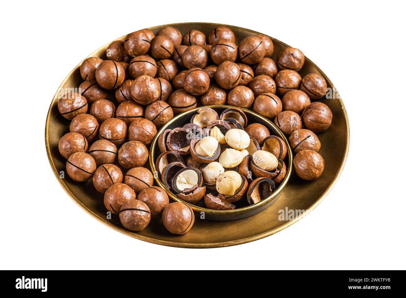 Organic Macadamia nuts in a shell ready to eat. Isolated on white ...