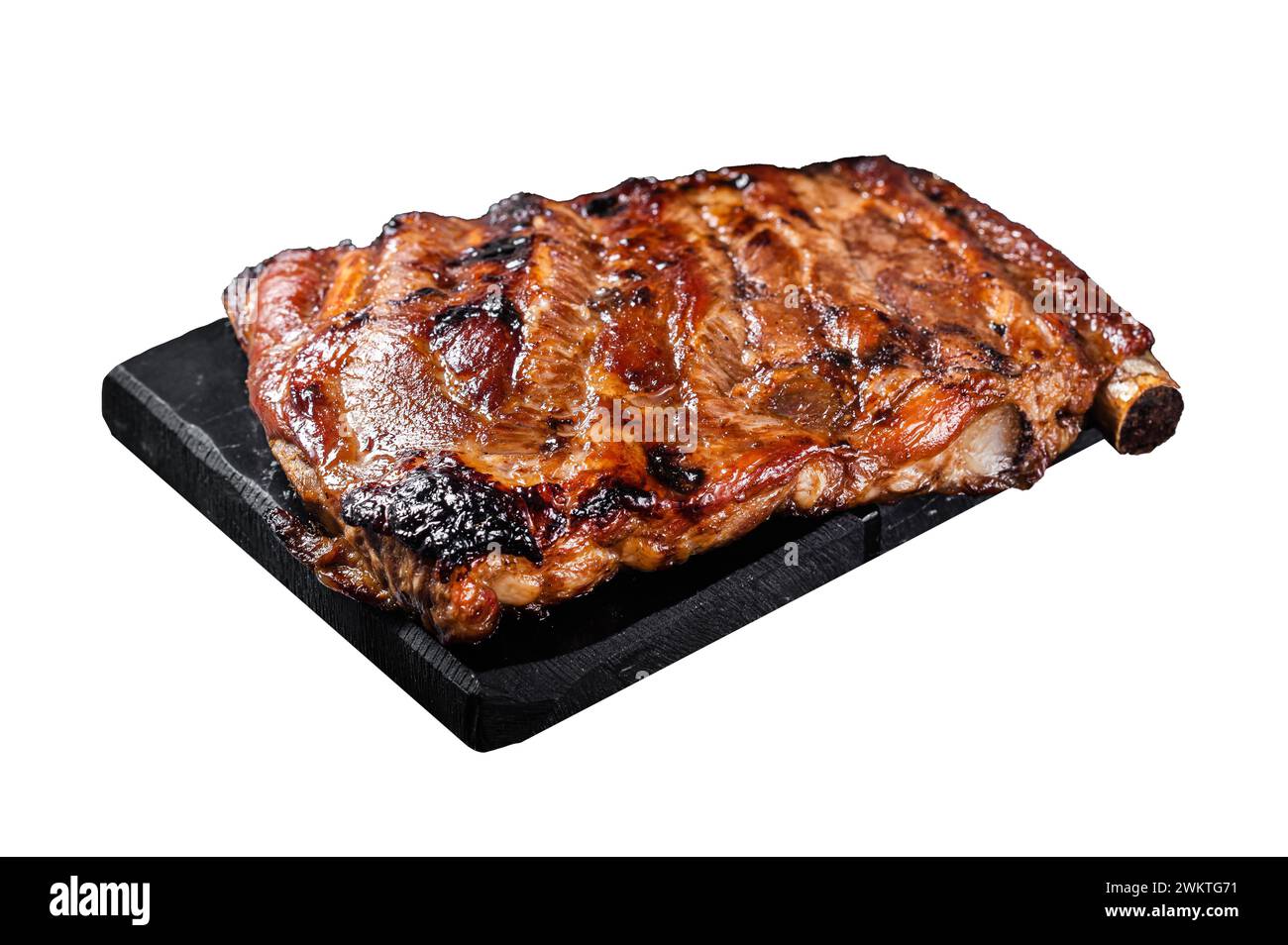 Full rack of BBQ grilled pork spare ribs on a marble board. Isolated on ...