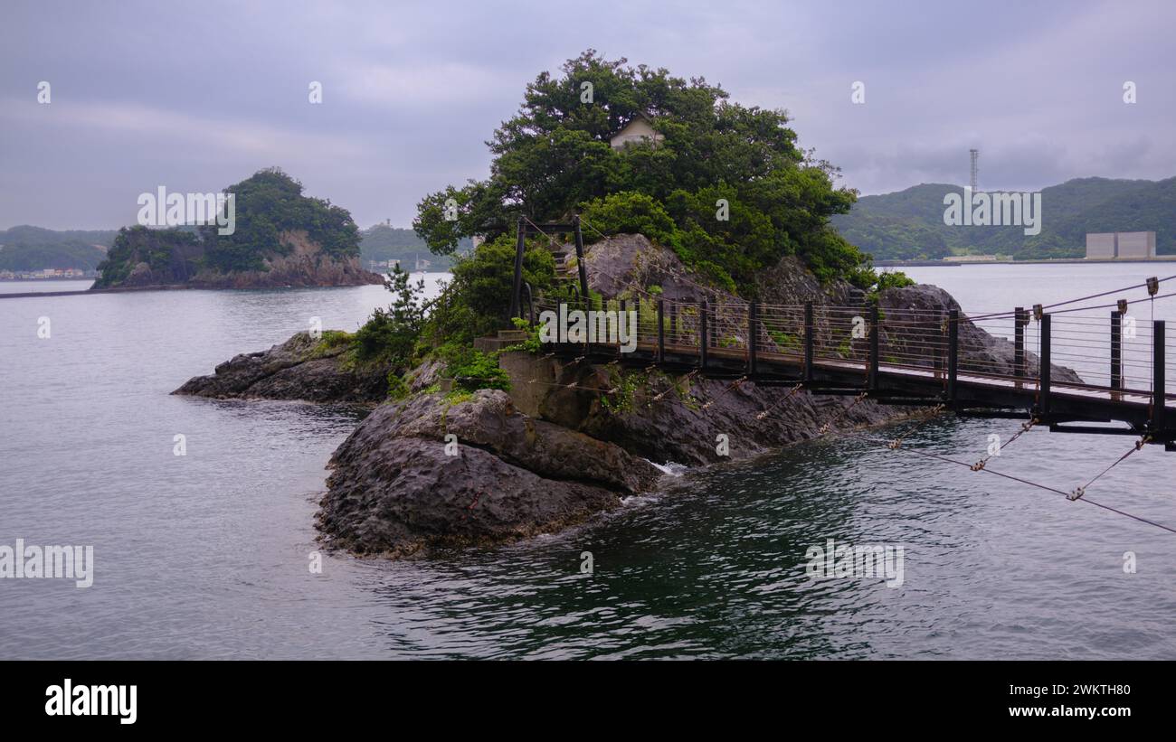 On the left, gracefully nestled amidst the waters, is Inubashiri-jima ...