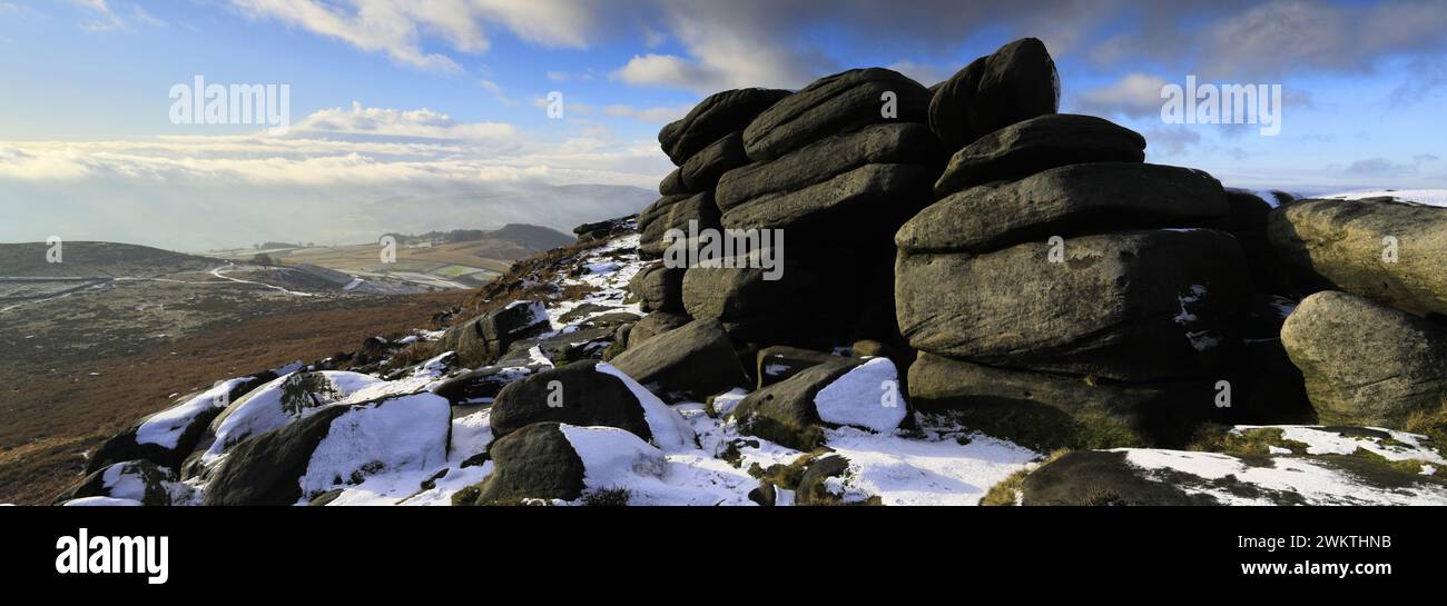 Winter snow over rock formations on Burbage Edge, Derbyshire; Peak ...