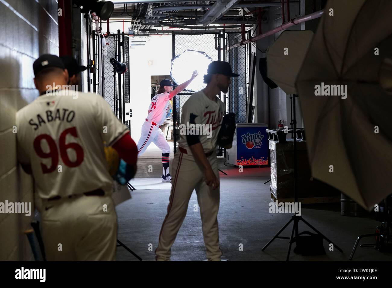 Minnesota Twins players and coaches line up to be photographed by news ...