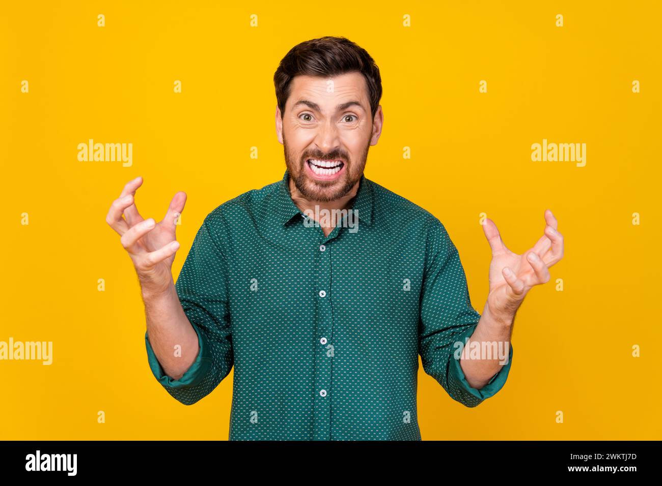 Photo of annoyed irritated crazy man with stylish haircut dressed ...