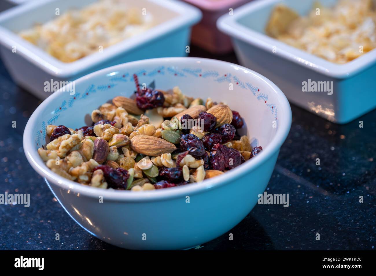 um ali is arabic sweet that made of puff pastry and nuts with milk and ...