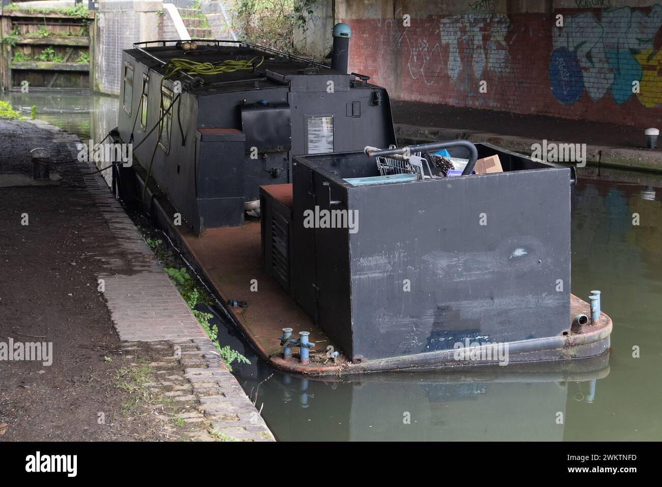 Harefield, UK. 20th February, 2024. An abandoned barge on the Grand ...