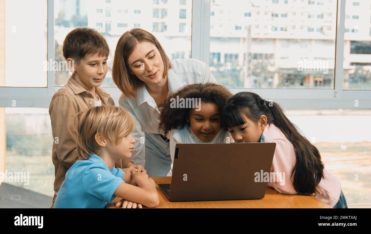 Cute african girl programing system while surround with caucasian ...