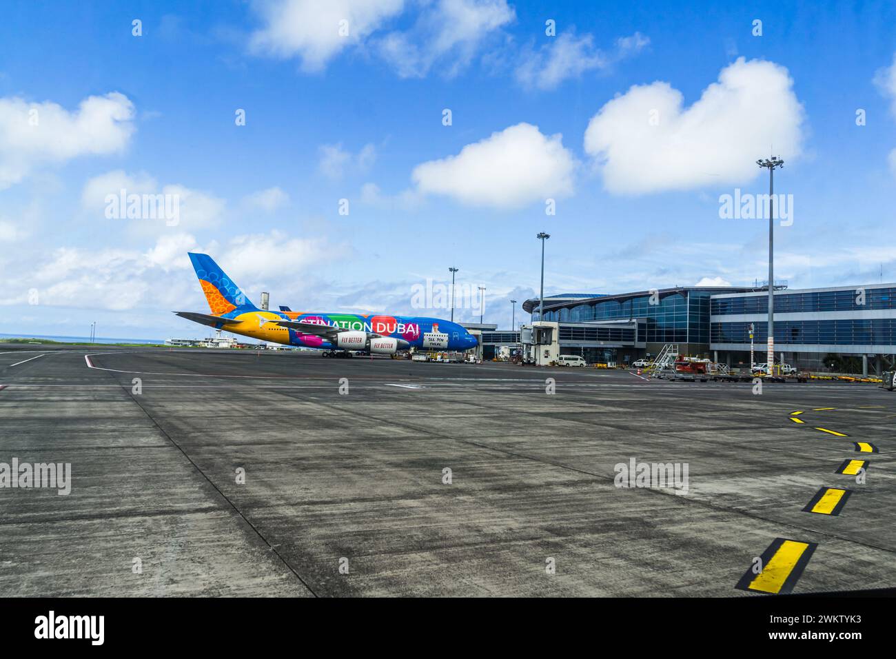Mauritius SSR airport 23 March 2023 - A colourful aircraft sits on the ...